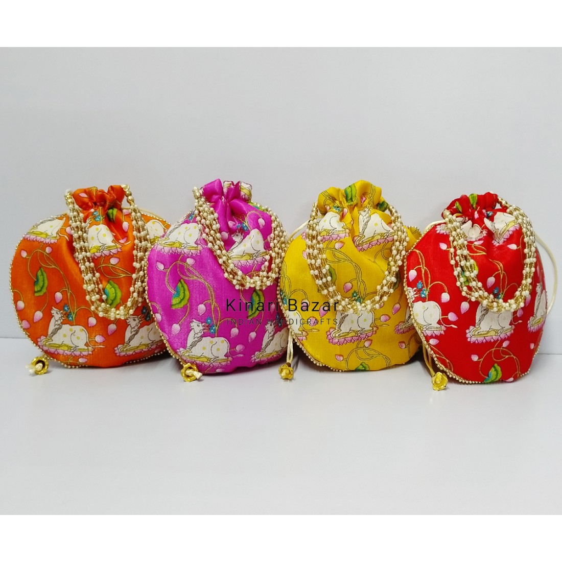 Pichwai Print Cow Matka Potli Bags - Kinari Bazar